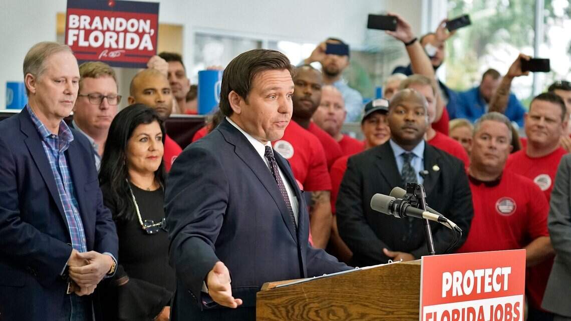 Florida governor signs anti-mandate COVID bills into law | Miami Herald